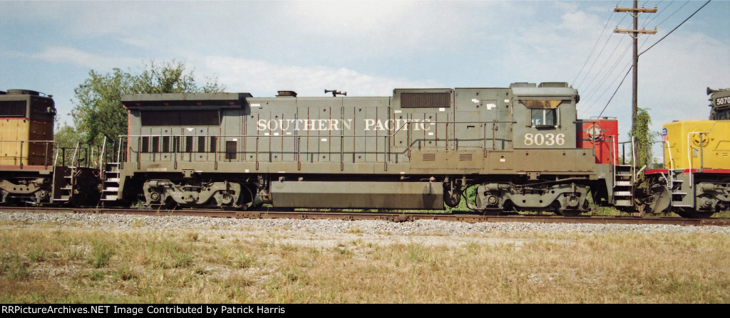 SP 8036 C39-8 trails UP 5070 SD50 X-CNW 7010 and SSW 7775 B30-7 with a UP intermodal eastbound ...